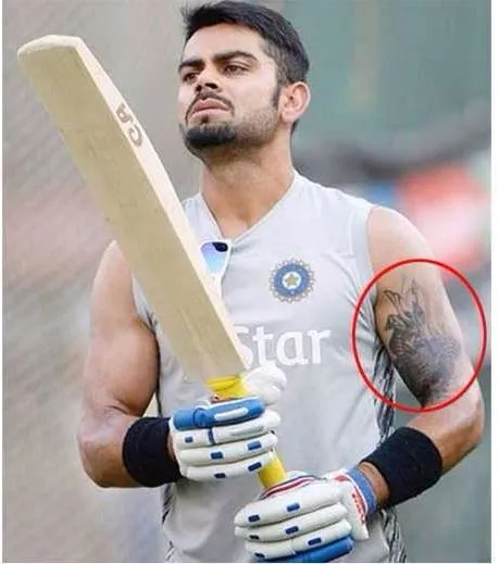 does dhoni have tattoos