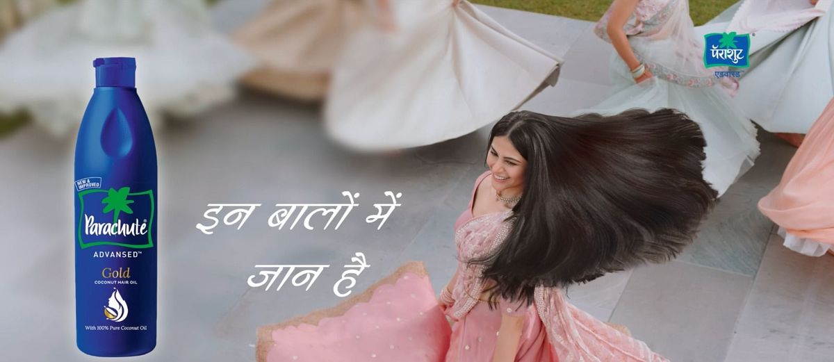 Parachute Advansed Gold highlights the essence of beautiful hair in its ...