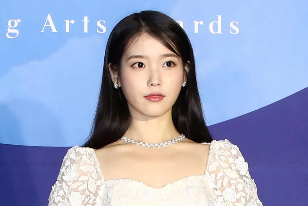 IU wins 'Rookie Actress Award' for her performance in 'Broker' at the ...