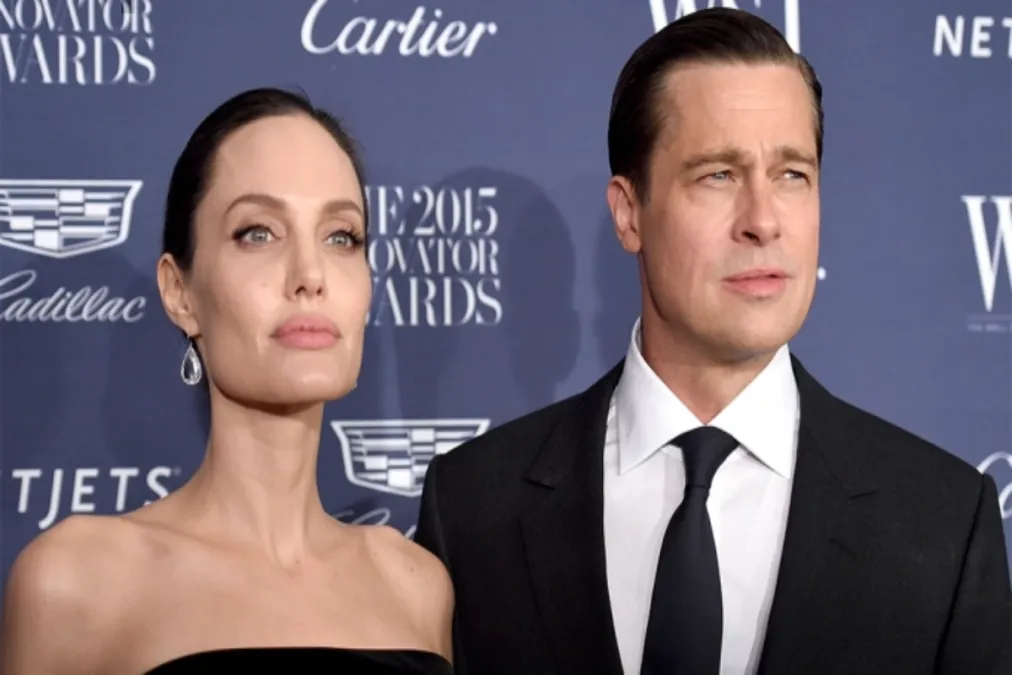 Angelina Jolie accuses Brad Pitt of choking one of her son and hitting ...