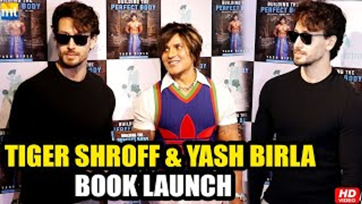 Action Man Tiger Shroff arrives with Yash Birla at 'Building The ...