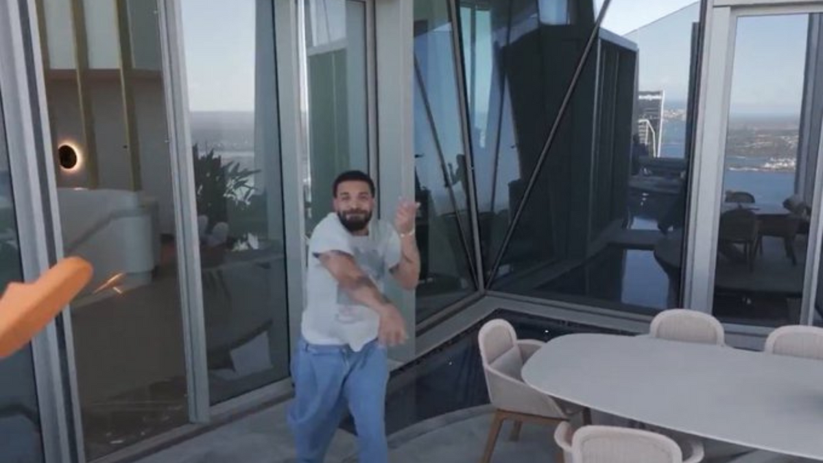 Drake aims his slipper at drone hovering around his apartment in viral video, Internet thinks it ...