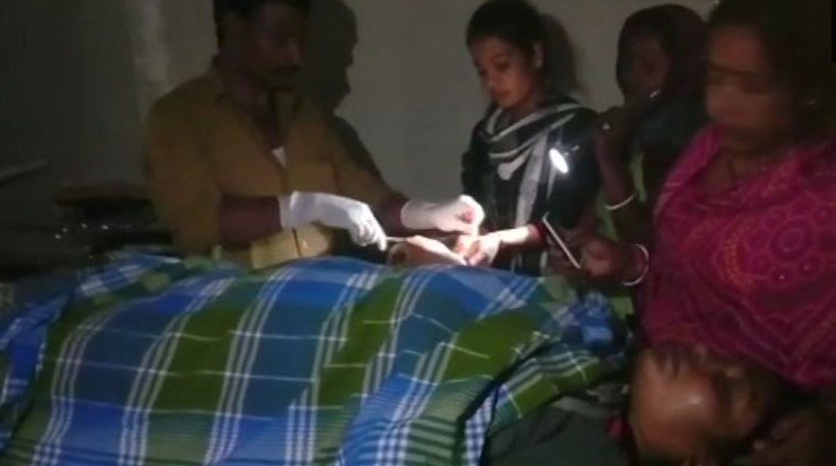 Watch: Bihar doctor operates on woman under torchlight