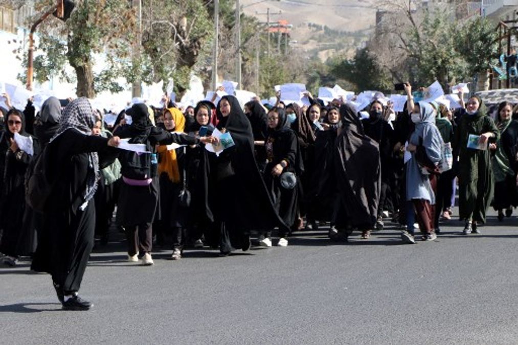 Female students protest against the deadly Kabul attack as toll jumps to 43