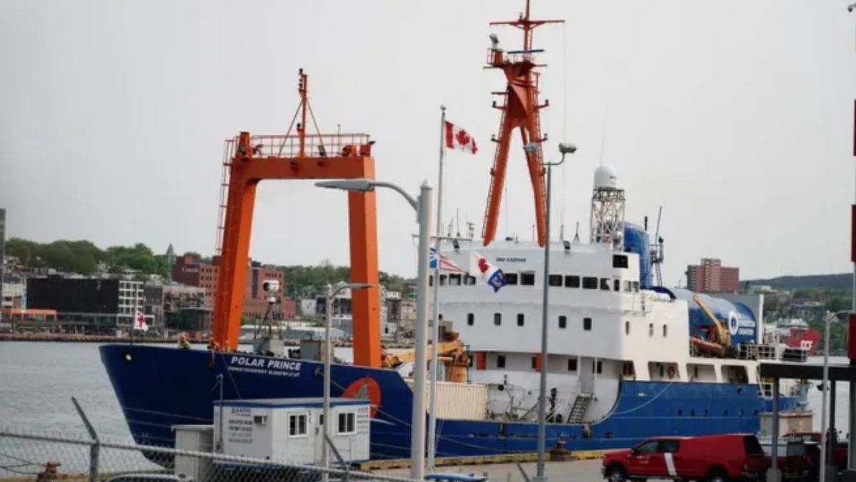 Titan submersible support ship Polar Prince returns to port, with flags ...