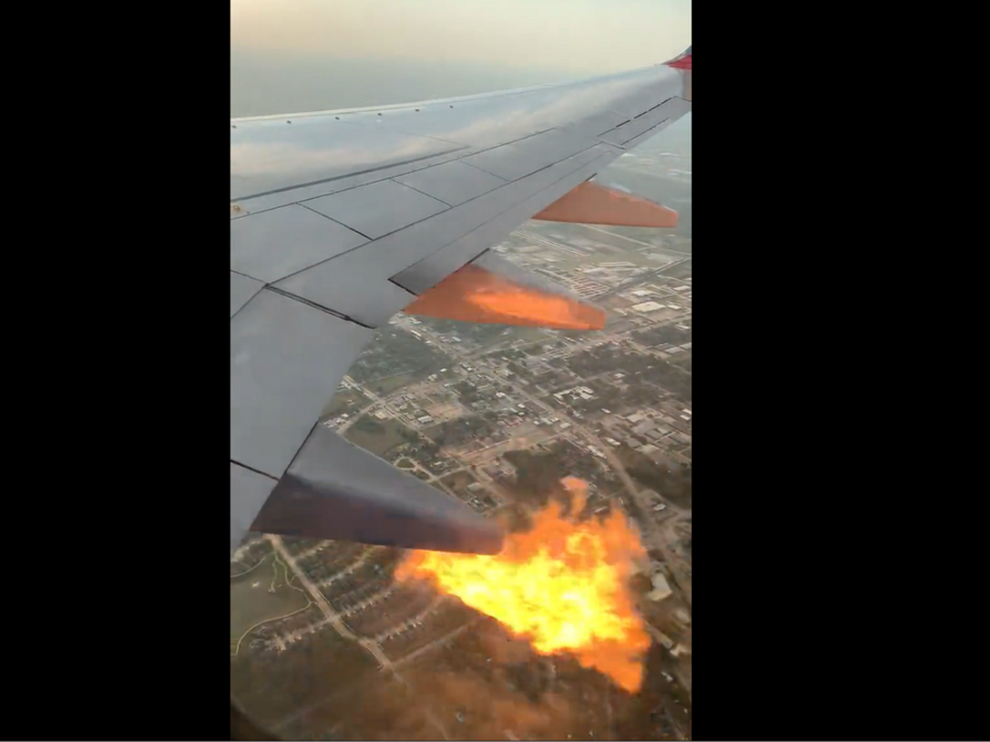 Watch | Passenger captures video of flames spewing from engine of ...