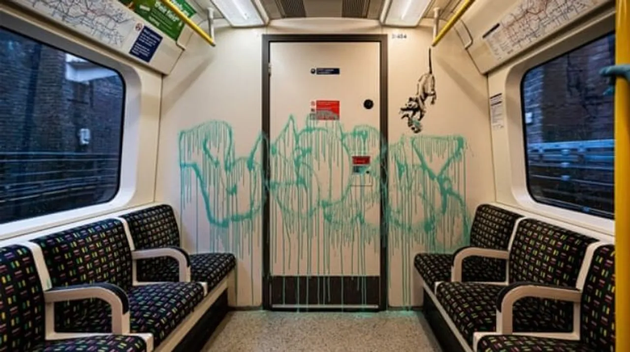 Banksy paints mural on Tube to encourage people to wear masks