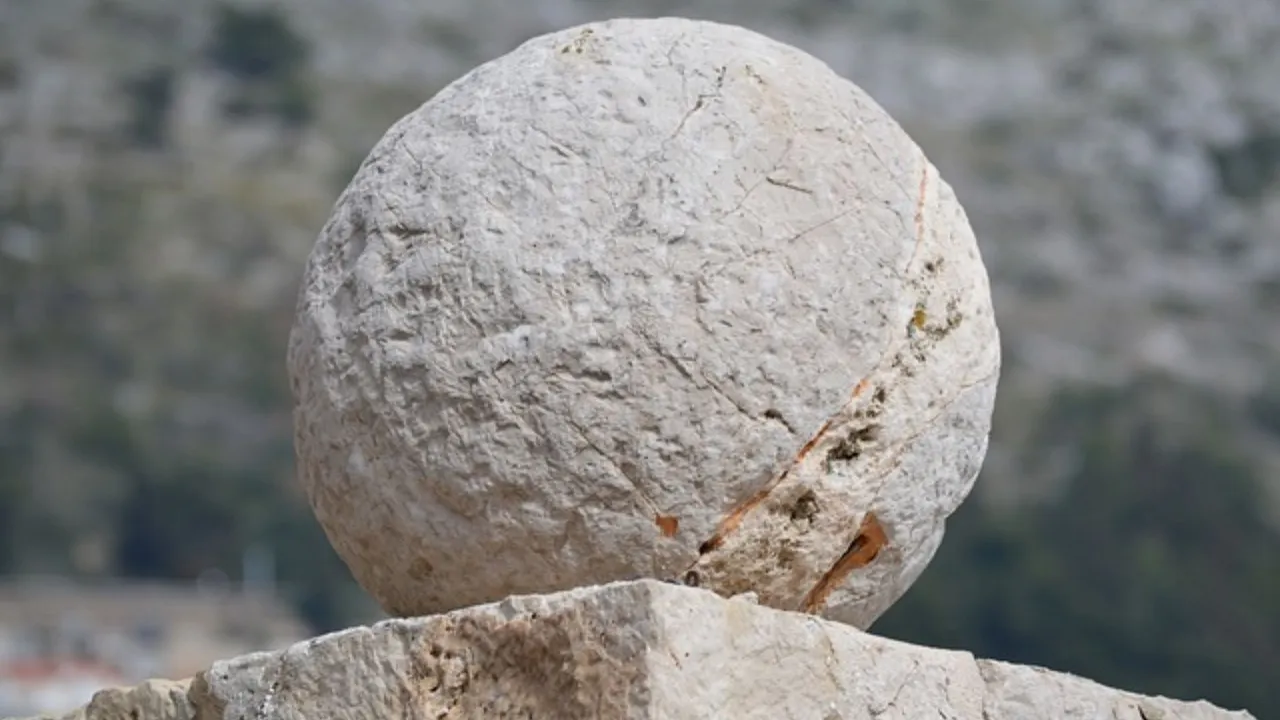 Our prehistoric ancestors turned stones into spheres for a reason, says ...
