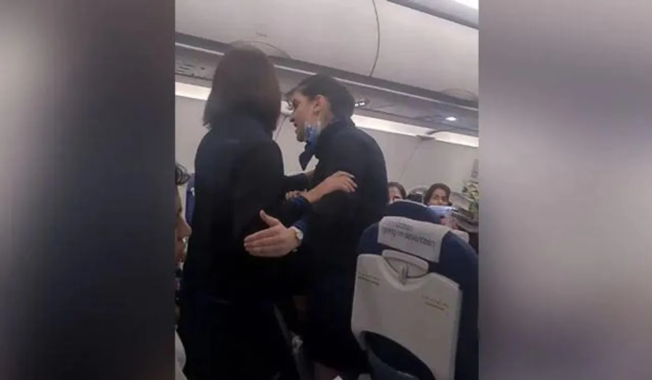 Netizens Divided Over Viral Video Of Flight Attendant And Passenger's ...