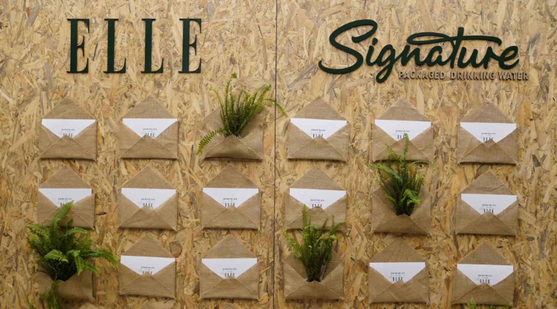 The Pledge Wall By Signature Packaged Drinking Water At The ELLE ...
